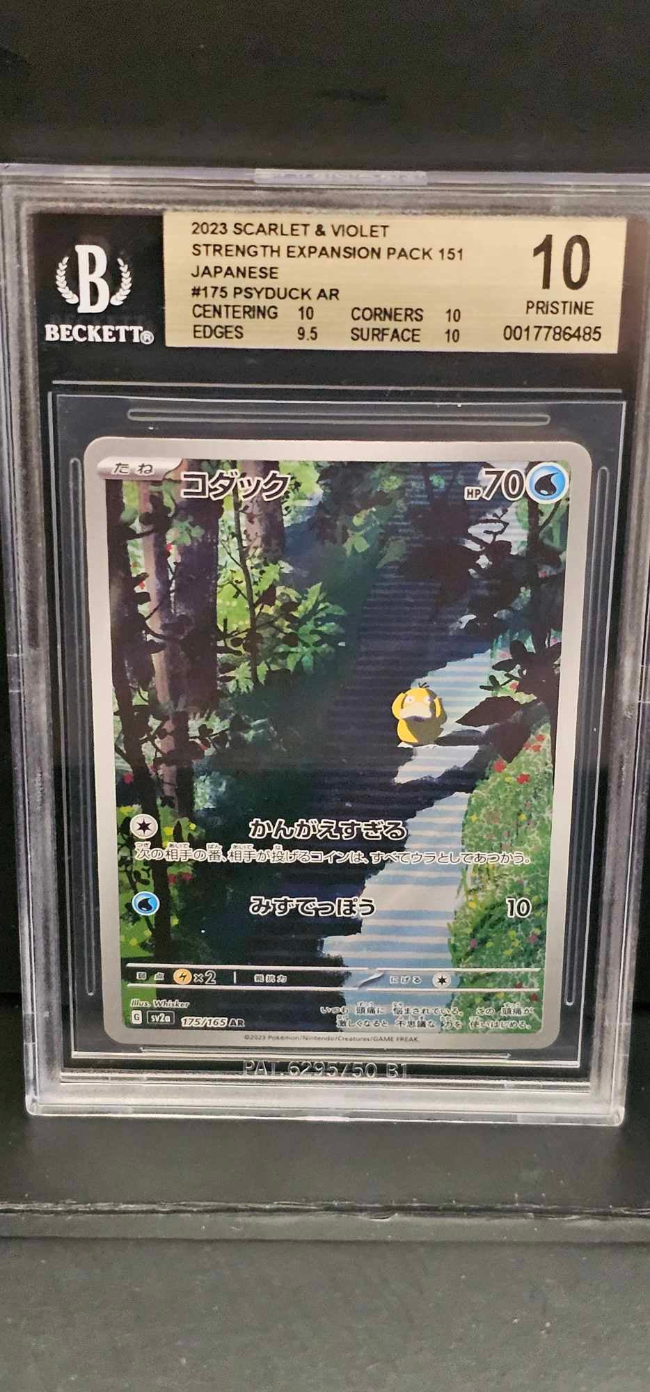 PSYDUCK -- JAPANESE -- BECKETT GRADE 10 | SR Comics International, LLC