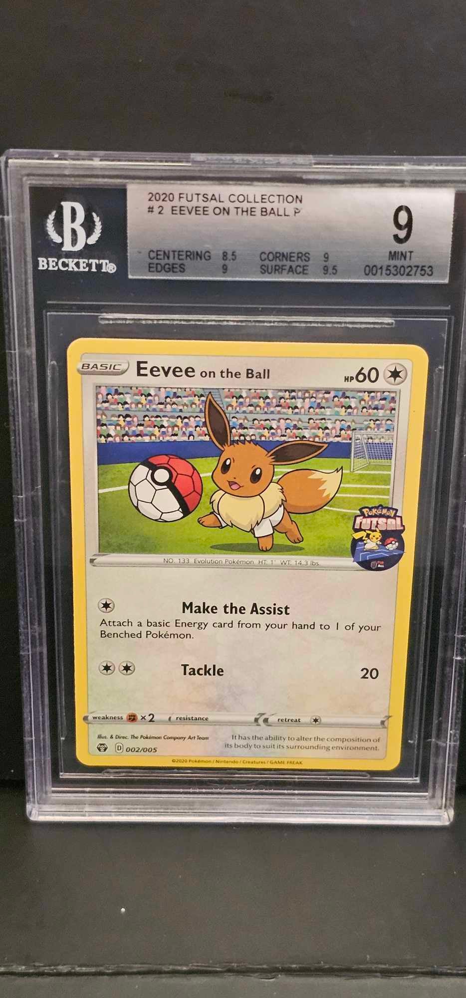 EEVEE ON THE BALL -- BECKETT GRADE 9 | SR Comics International, LLC